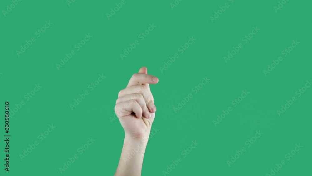Male hand with snapping fingers on green screen background. Chromakey ...