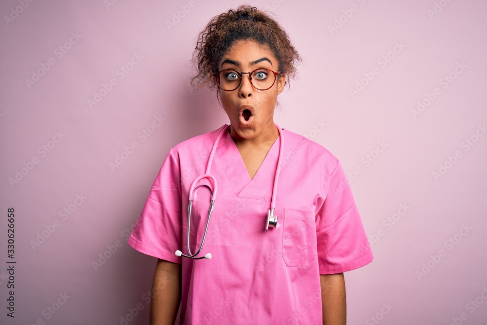 African american nurse girl wearing medical uniform and stethoscope ...