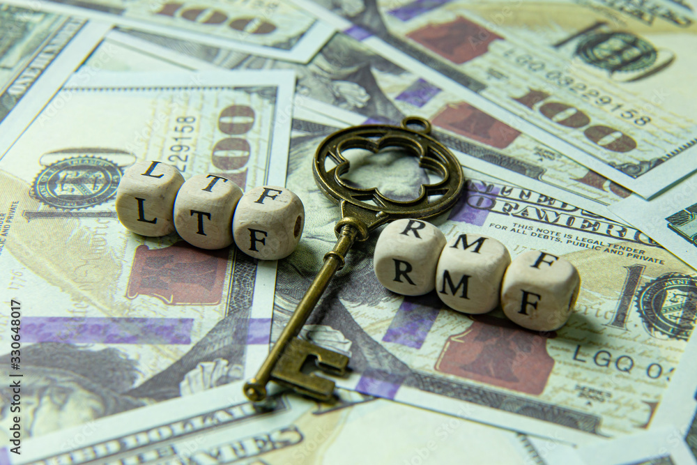 Foto de ltf and rmf wooden cube gold key vintage on banknotes for ...