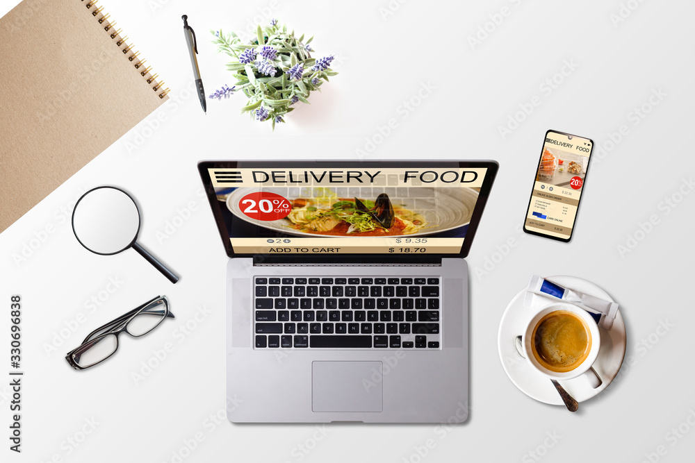 ordering take away food by internet with a laptop, food delivery Stock ...