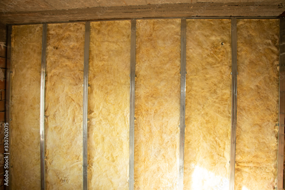 Wool wall insulation, internal insulation Stock Photo | Adobe Stock