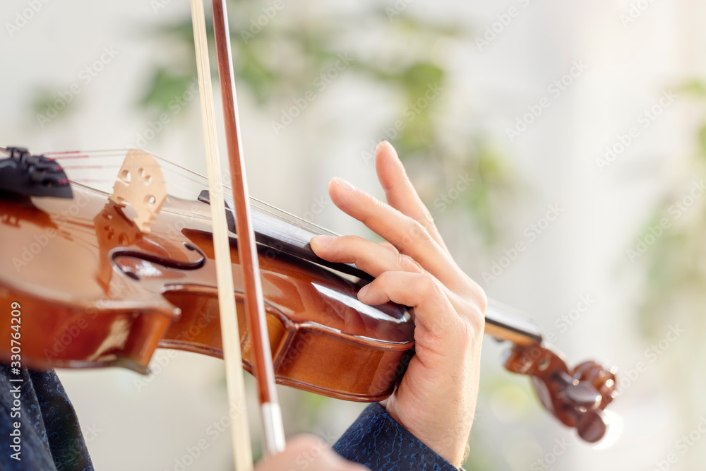 Violinist player hands playing violin Stock Photo | Adobe Stock