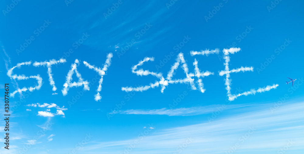 Stay Safe written in the sky with airplane contrails Stock Photo ...