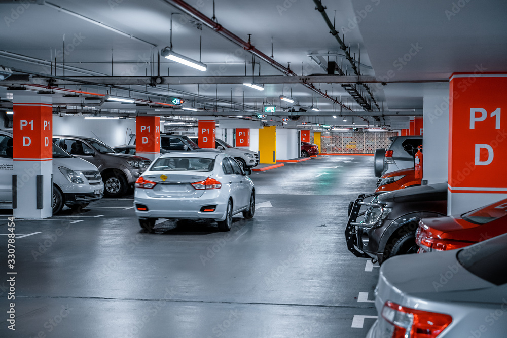 Parking garage - interior shot of multi-story car park, underground ...