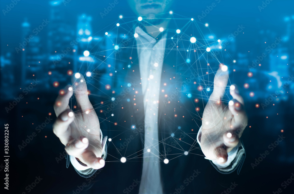 The hand of a businessman touching the connection line on the city ...