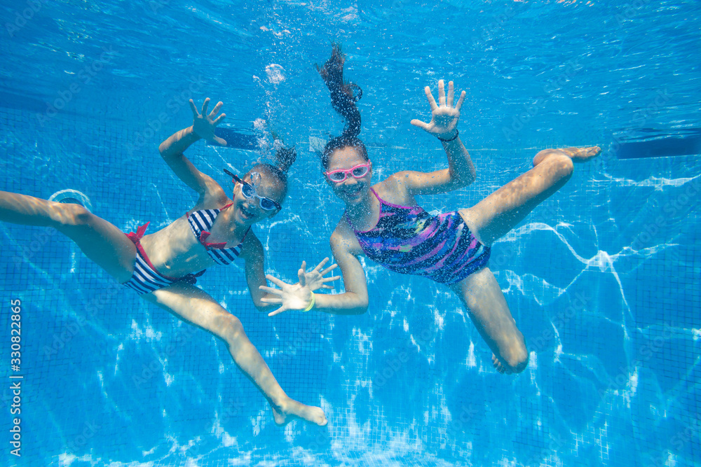 girls in swimming pool Stock Photo | Adobe Stock