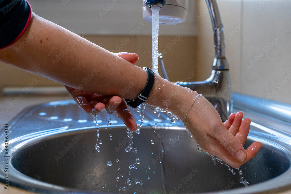 Washing arms and hands properly. Hygiene concept. Rubbing with water ...
