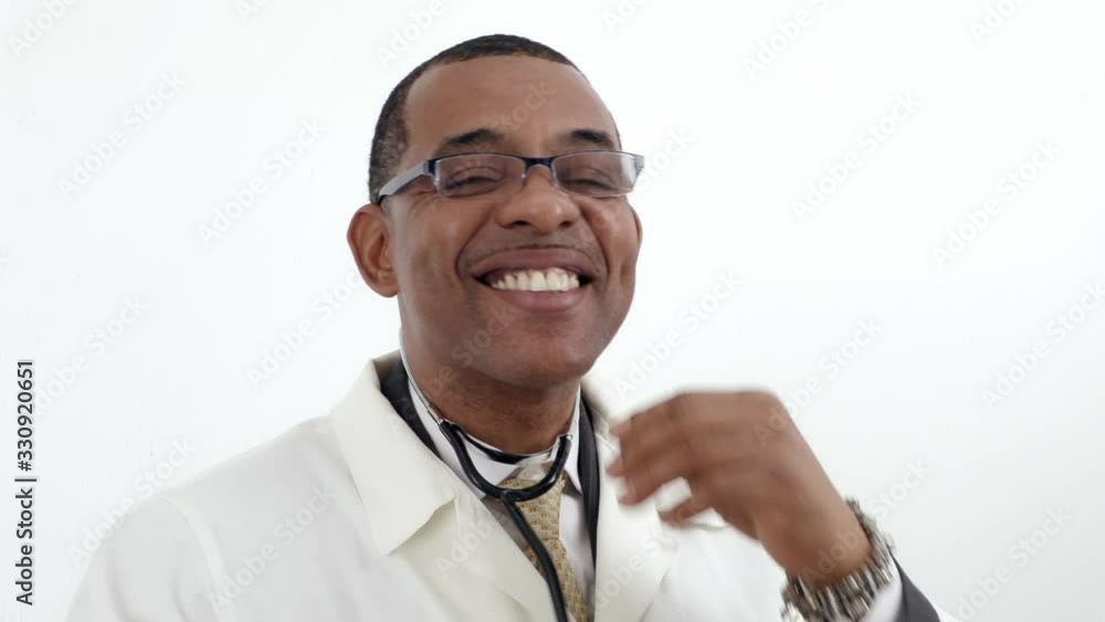 Jamaican African-American man doctor in white lab coat in glasses ...
