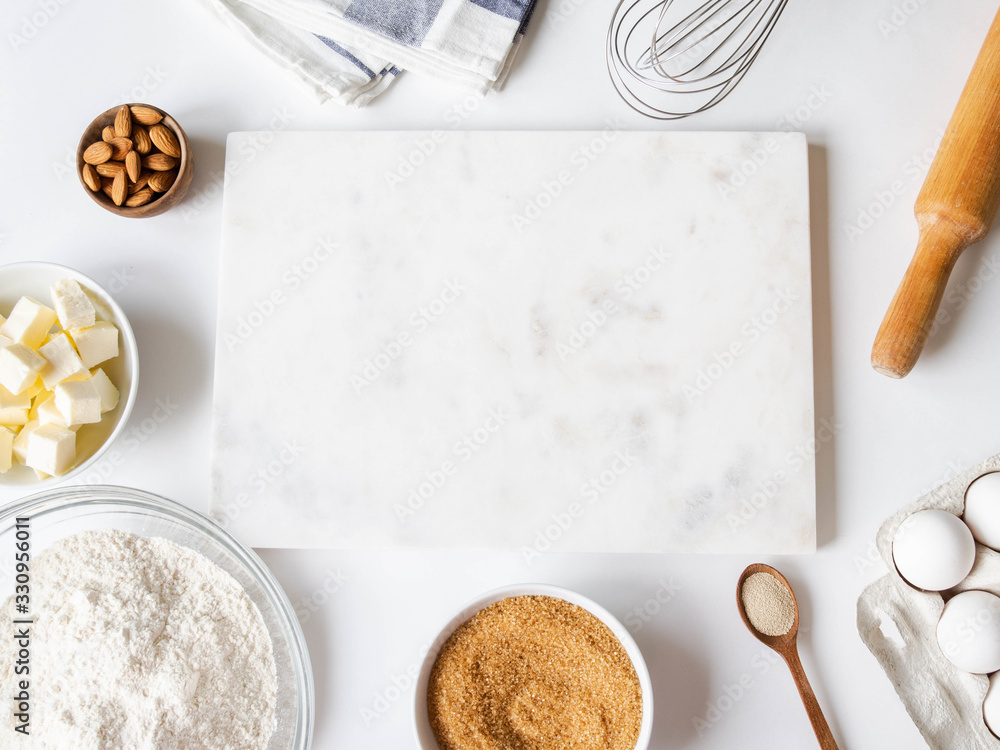 Frame of various baking ingredients - flour, eggs, sugar, butter, dry ...