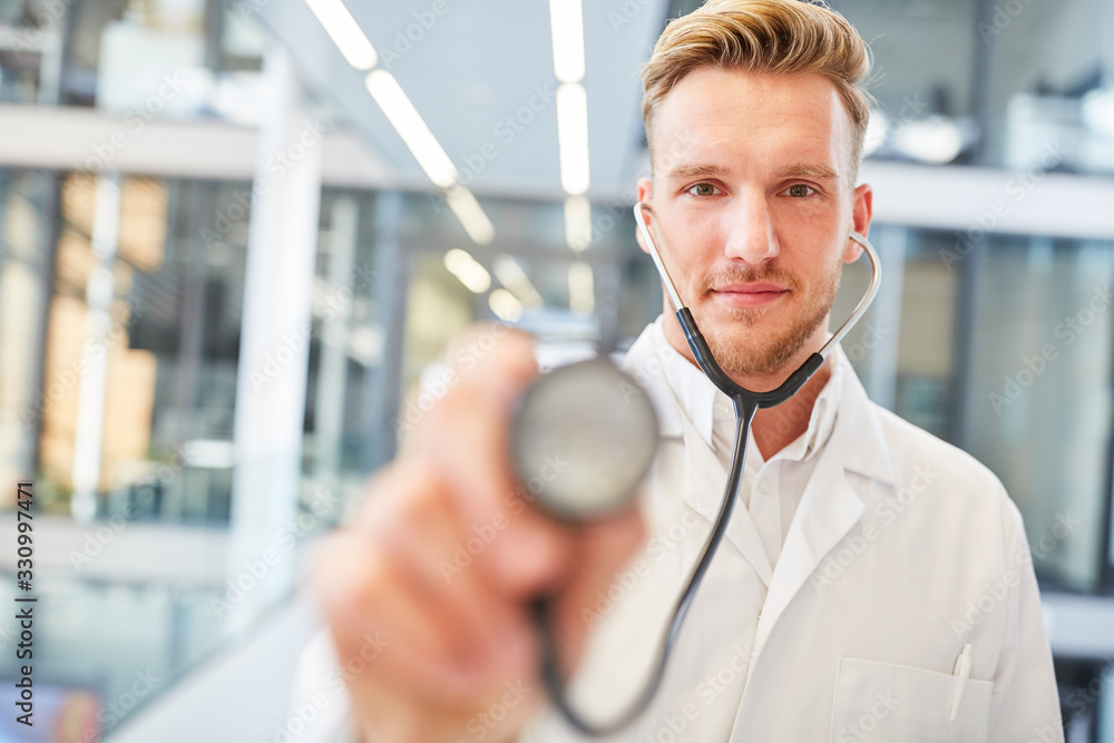Junger Mann als Internist in der Ausbildung Stock Photo | Adobe Stock