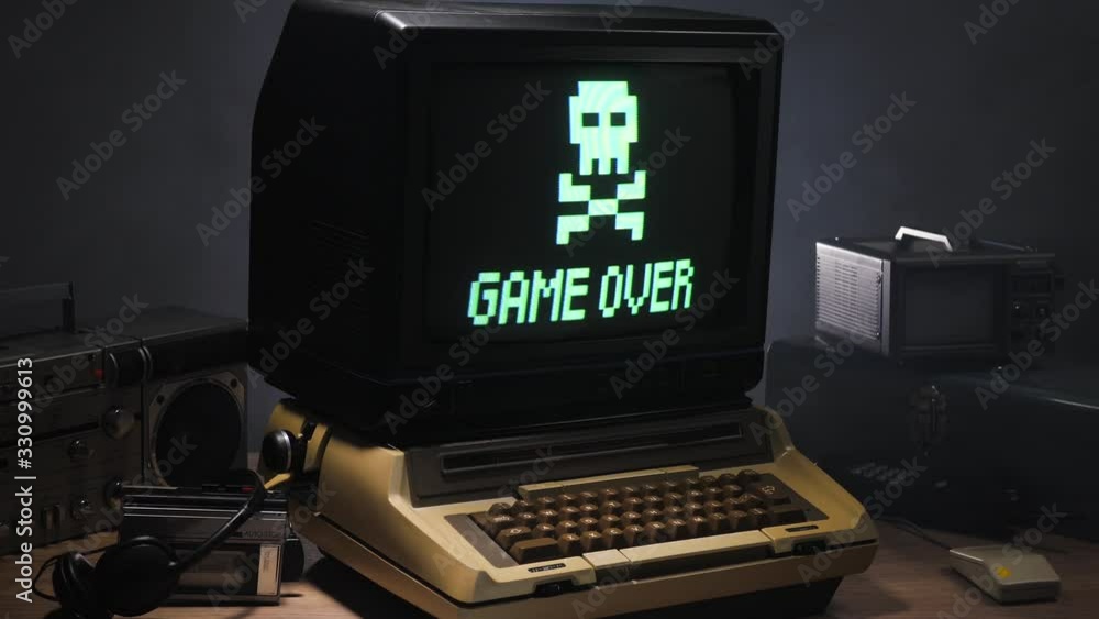 Vintage computer setup from the 70s 80s with game over message blinking ...