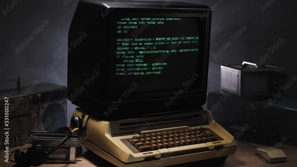 Black screen of a vintage style computer from 70s 80s filling up with ...