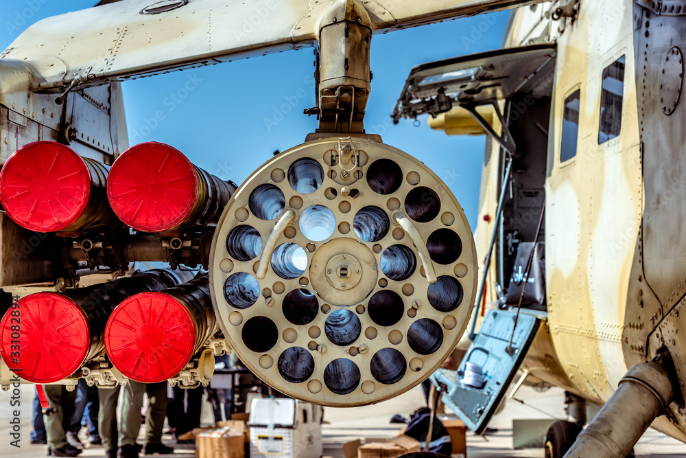 Foto de Military helicopter equipped with guided anti-tank missiles and ...