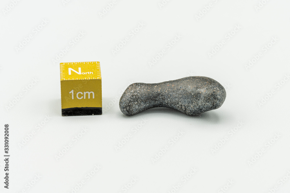 Black magnetic Atacaimite Tektite Meteorite isolated, a rock formed in ...