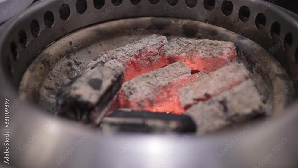 4k close up heated coal ready to cook, set up grilling fire, japanese ...