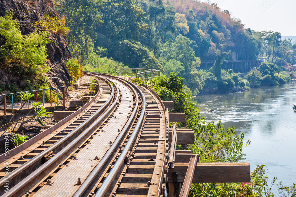 The Death Railway crossing kwai river with Krasae Cave in Kanchanaburi ...