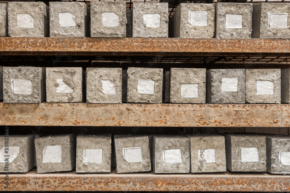 Concrete cubes. Samples of hardened concrete for laboratory tests Stock ...