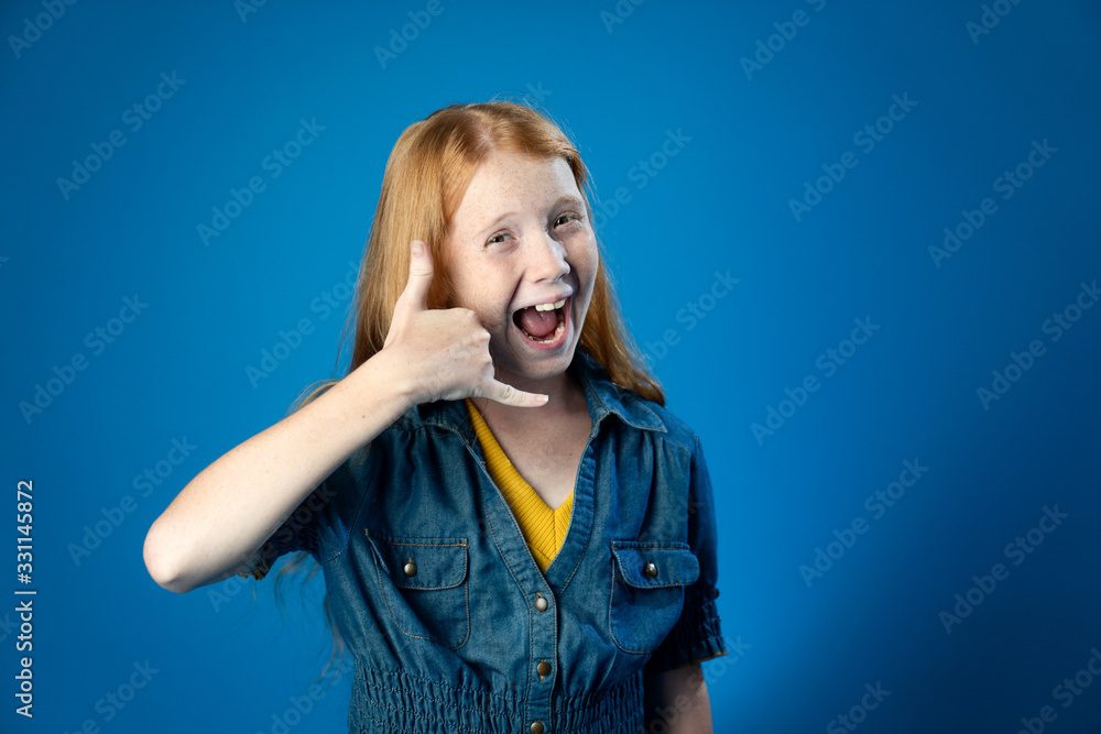 Teenager Girl Doing the shaka hand gesture Call me sign Stock Photo ...