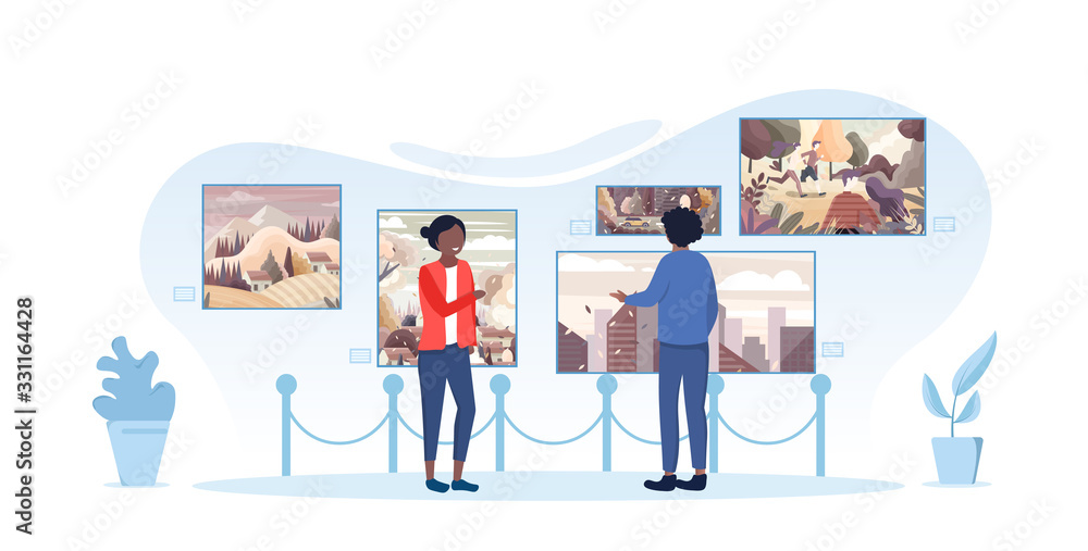 Young black couple viewing exhibits in a museum standing in front of ...