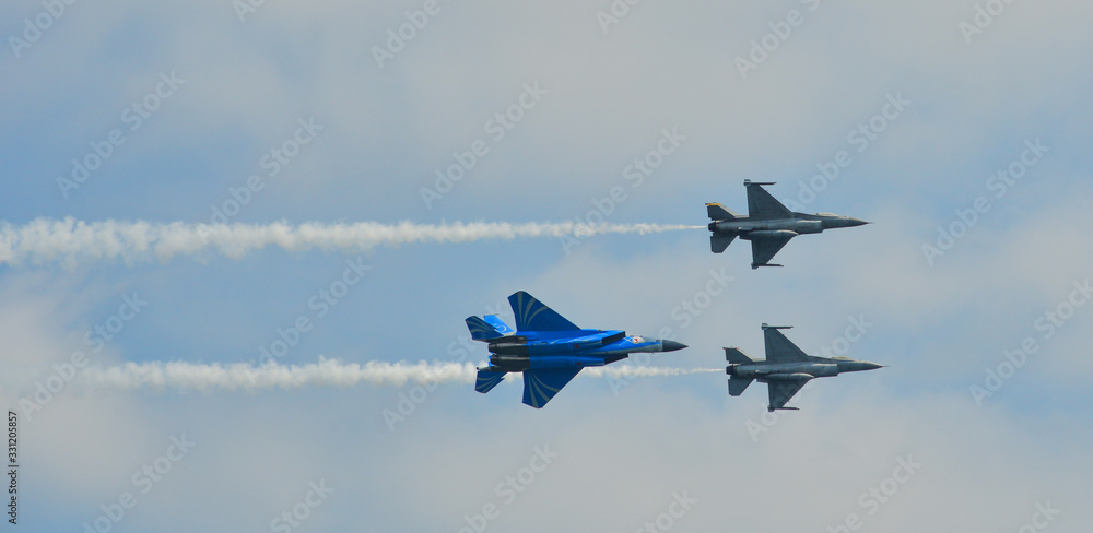 Fighter jet flying on display near Changi Air Base Stock Photo | Adobe ...