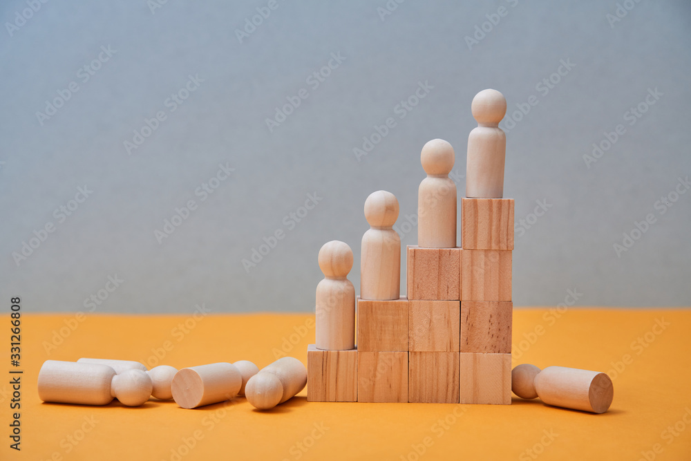 Business, corporate hierarchy. Command chain. Pyramid of wooden ...