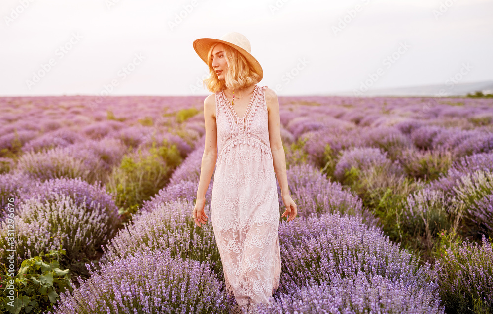 Elegant lady in lavender field Stock Photo | Adobe Stock