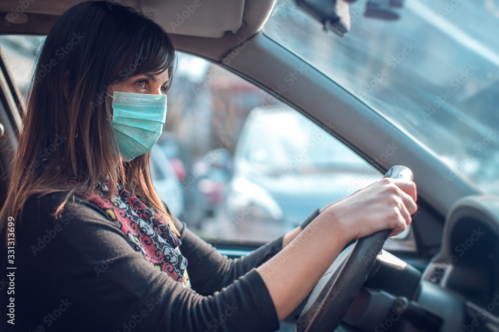 driving car with face mask Stock Photo | Adobe Stock