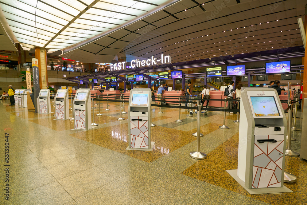 SINGAPORE - CIRCA APRIL, 2019: self check-in kiosks at Changi ...