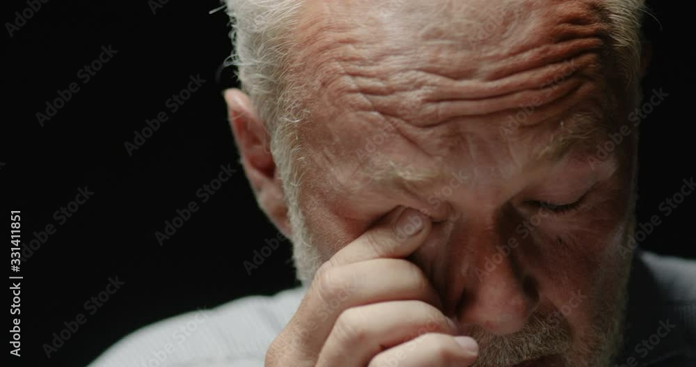 Close up portrait of sad handsome Caucasian old man with serious face ...
