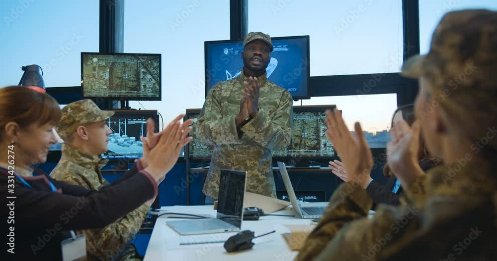 African American man, young head in army finishing military conference ... African American man, young head in army finishing military conference ...