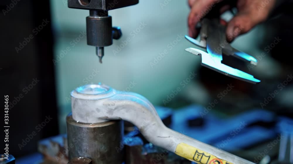 Worker using vernier calipers. Industrial worker measuring detail with ...