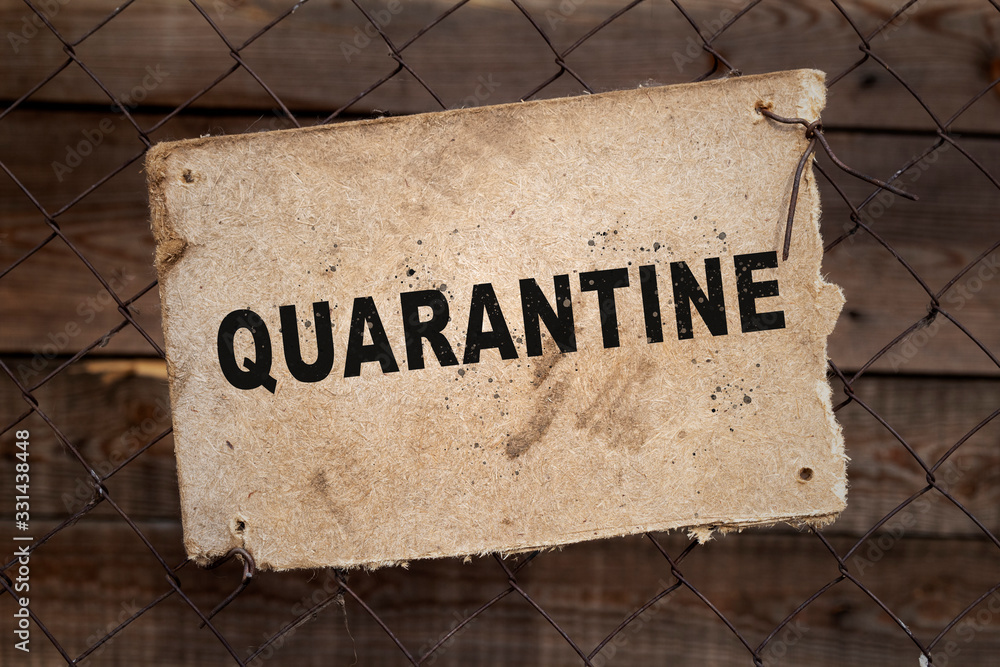 Foto de Sign with the word quarantine on an iron grid. Warning about ...