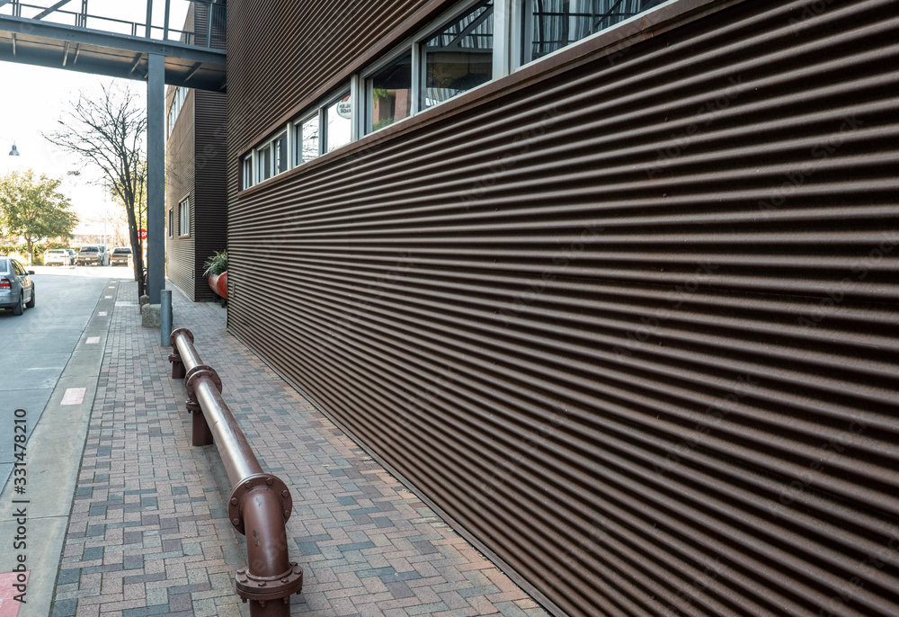 Industrial building exterior wall facade with horizontal lines for ...