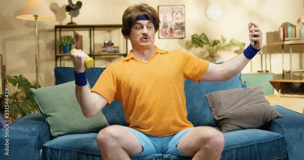 Stylish Caucasian funny male model making selfie photo on smartphone ...