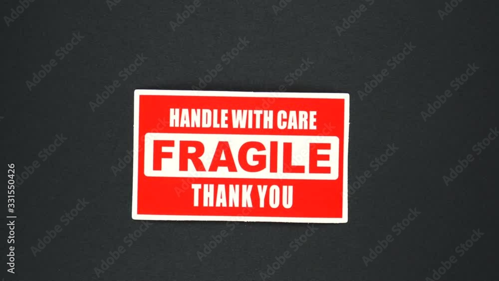 FRAGILE warning sign word text Stock Video | Adobe Stock