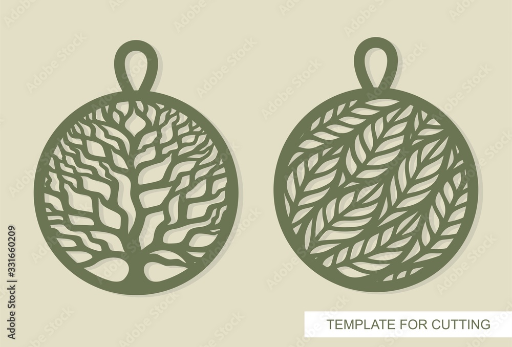 Set of pendants with a tree of life in a round frame and a pattern of ...