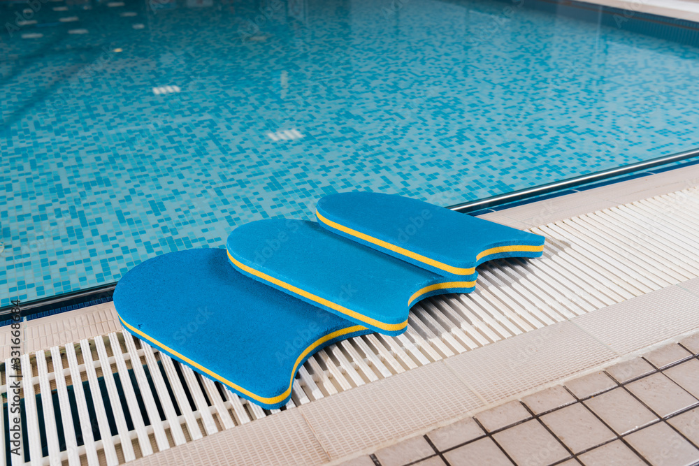 blue flutter boards near swimming pool in sports center Stock Photo ...