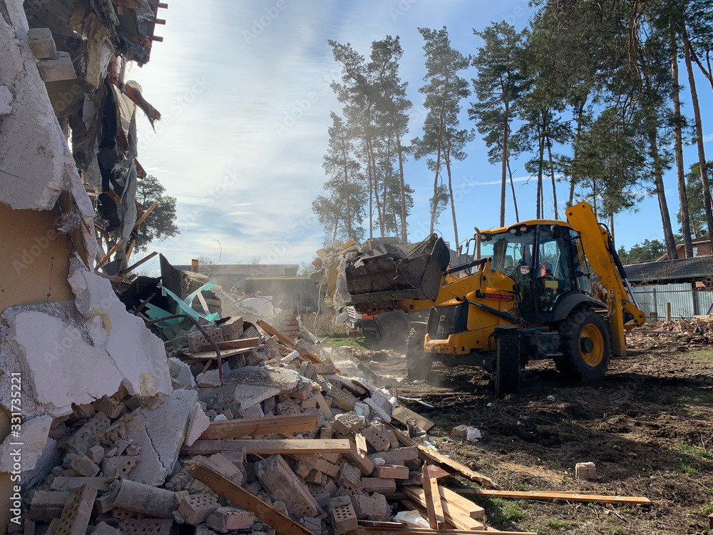 Ruined, brick, residential building. The ruins of a collapsed mansion ...
