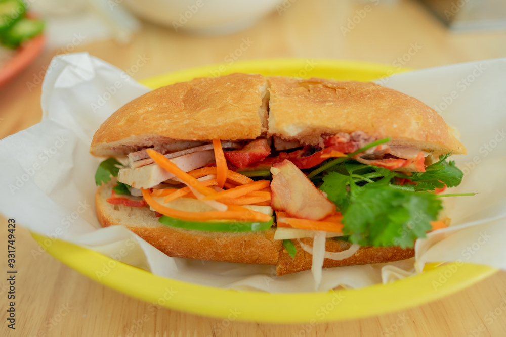 banh minh with roast pork - cut in half Stock Photo | Adobe Stock