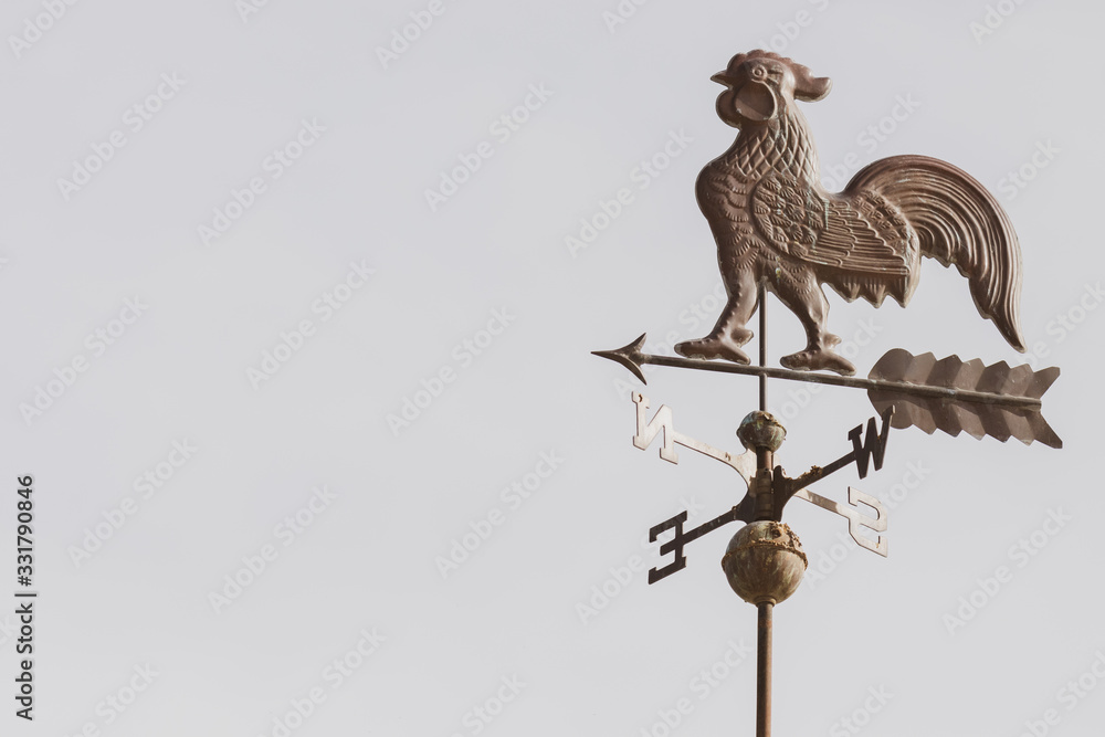 Weather vain with rooster and north, south, east, west directions Stock ...