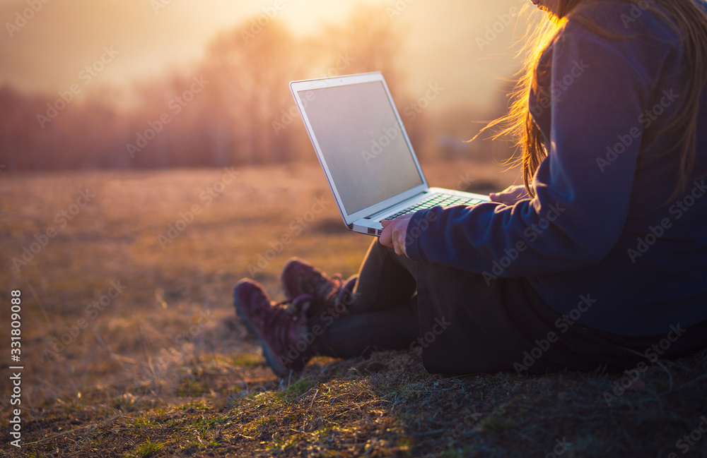 Using laptop computer in nature, technology and freedom concept Stock ...