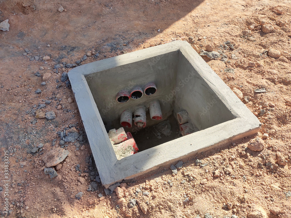 Utility services manhole under construction at the construction site ...