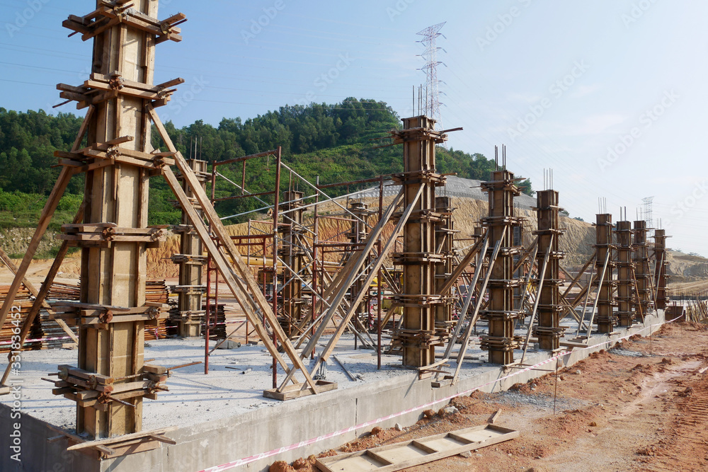 Column timber form work and reinforcement bar at the construction site ...