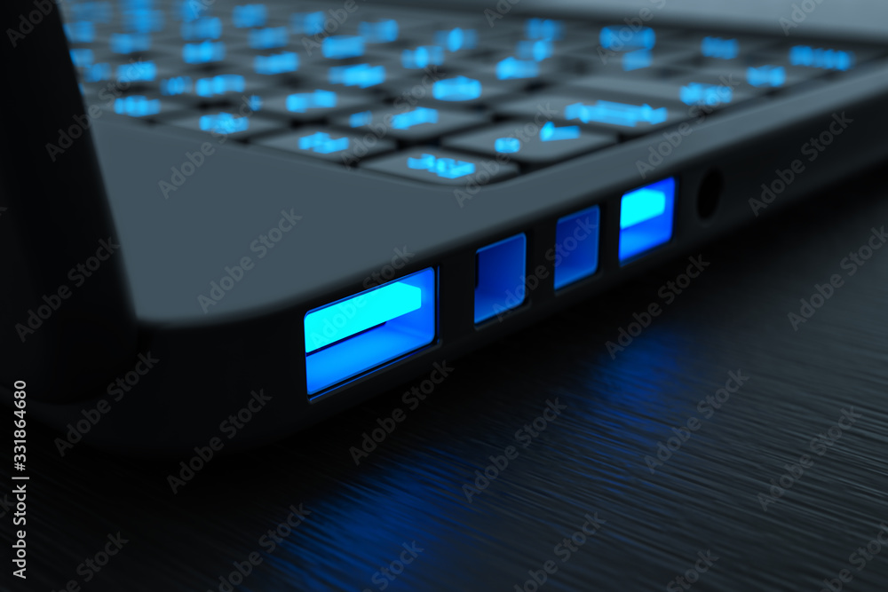 USB port and glowing symbol in dark, modern keyboard buttons, close up ...