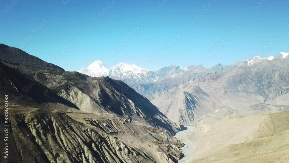 A panoramic shot of Manang Valley in Nepalese Himalayas. There is a ...