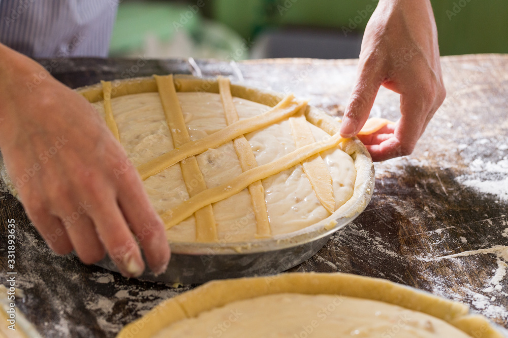 Preparation of Easter cake, also called Pastiera Napoli, typical ...