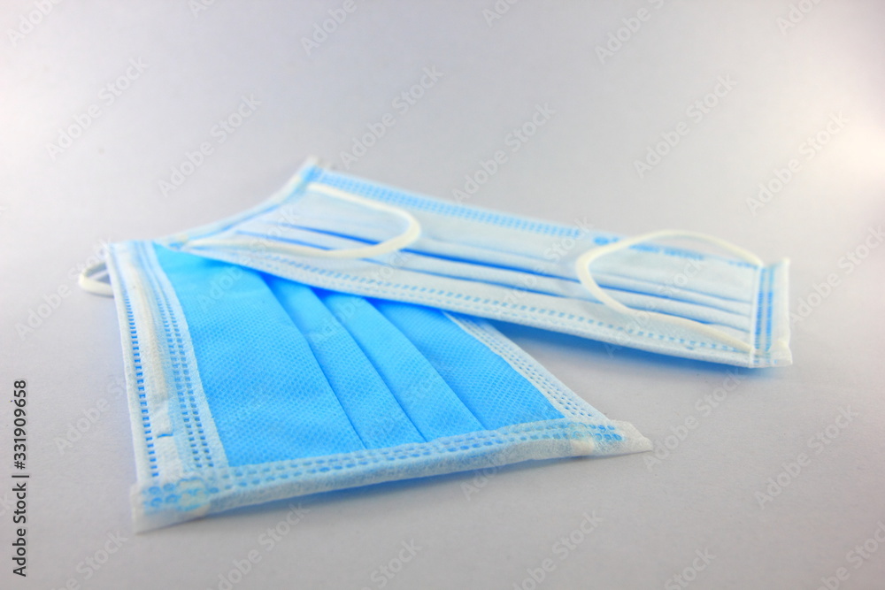 Mask protect covid-19 ,Blue mask on gray background.corona virus ...