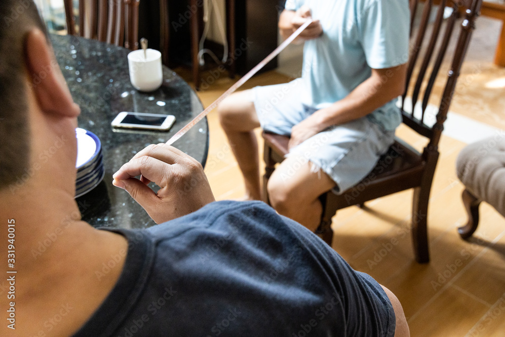 Two person measured their distance to ensure they are seated apart in ...