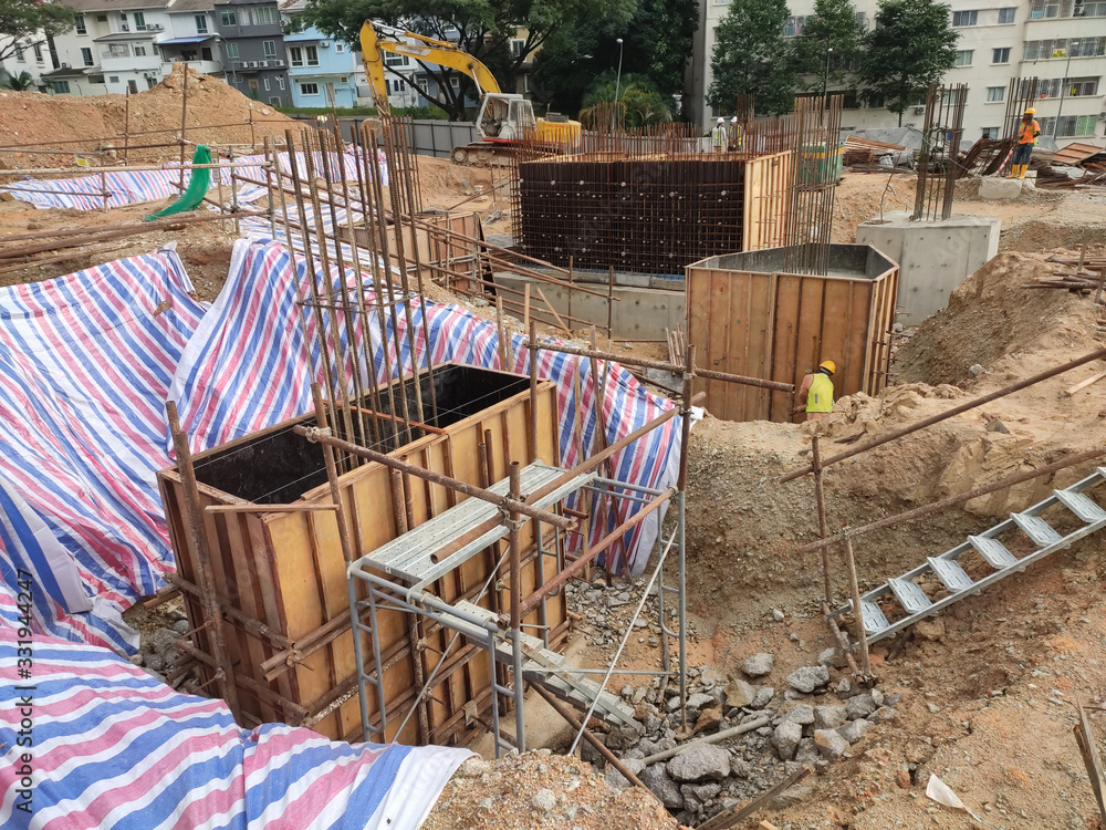Pile cap and column stump under construction at the construction site ...