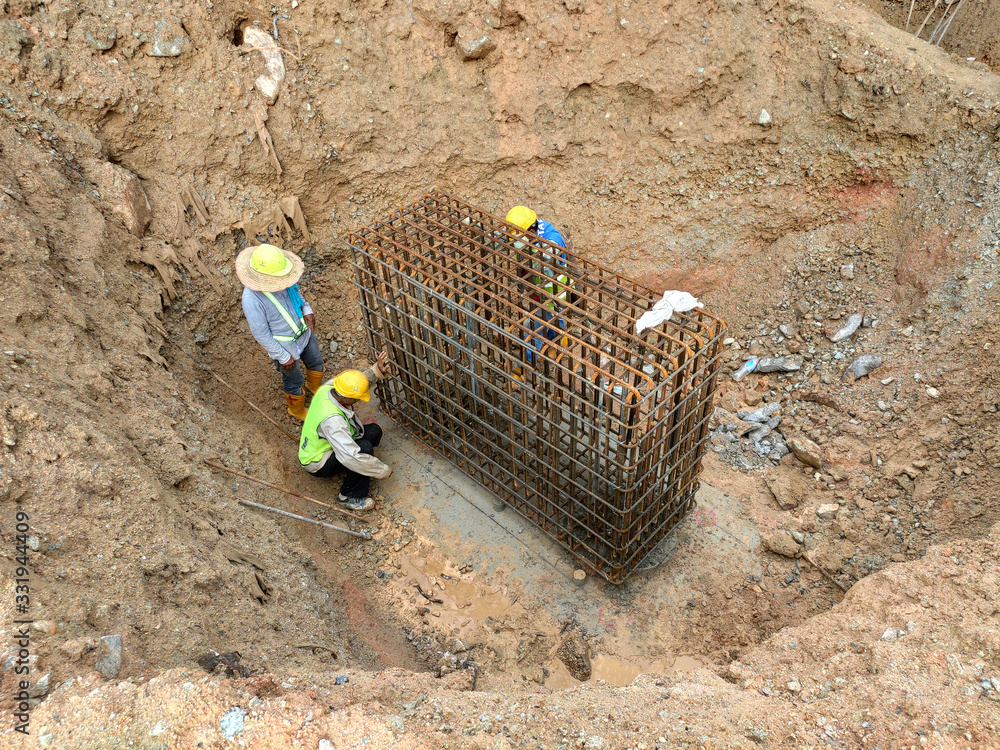 Pile cap and column stump under construction at the construction site ...